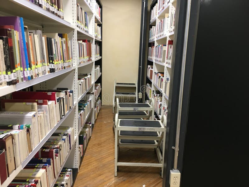 Public Library Book Shelf Filled with Books Stock Image - Image of ...