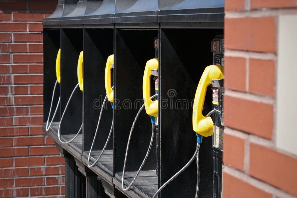 Public phones stock image. Image of public, yellow, phone - 5086819