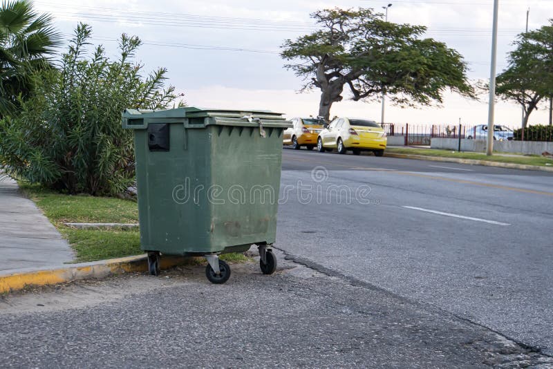 Public Plastic Green Waste Garbage Containers on Streets of the City ...