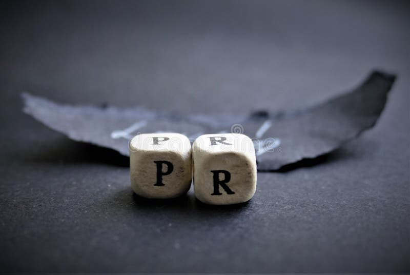 Public Relations Letter on Dark Background Stock Photo - Image of ...