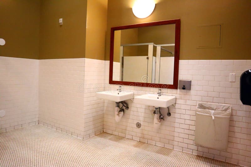 Public Restroom with White Tiles Stock Image - Image of room, ceramic ...