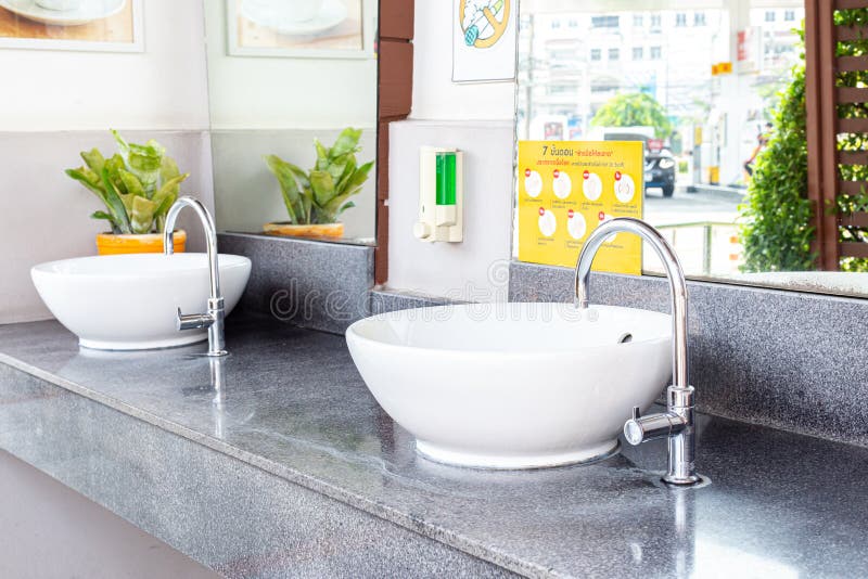 Public Sinks, Handwashers for People Using Public Toilets Editorial ...