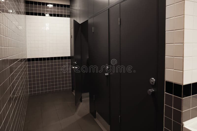Public Toilet Interior with Stalls and Tiled Walls Stock Image - Image ...