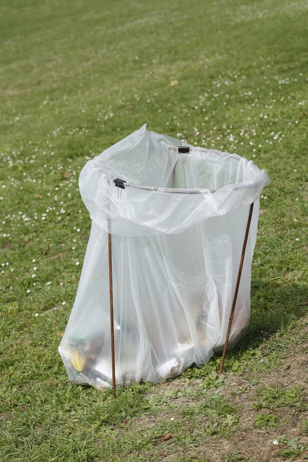 Public Wastebasket Standing on a Meadow, Garbage Bag, Rack Stock Image ...