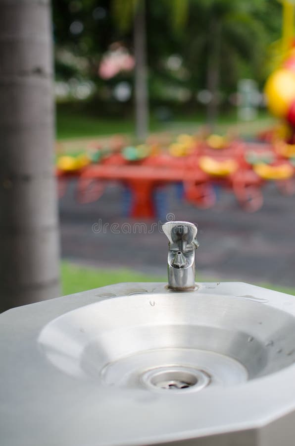 Public water tap stock image. Image of tired, outside - 44838365