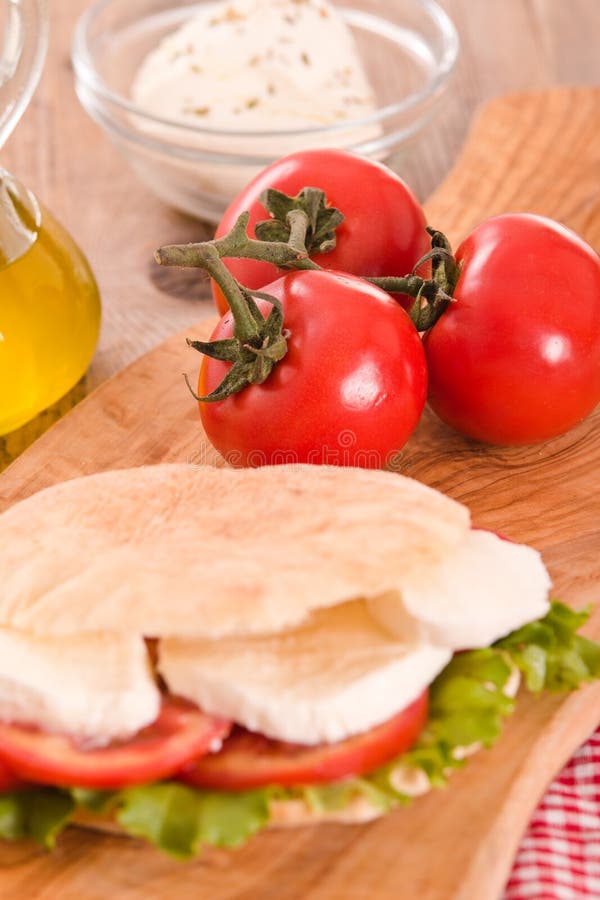 Puccia Bread with Mozzarella and Tomato. Stock Image - Image of ...