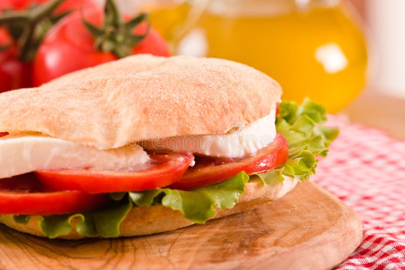 Puccia Bread with Mozzarella and Tomato. Stock Photo - Image of ...