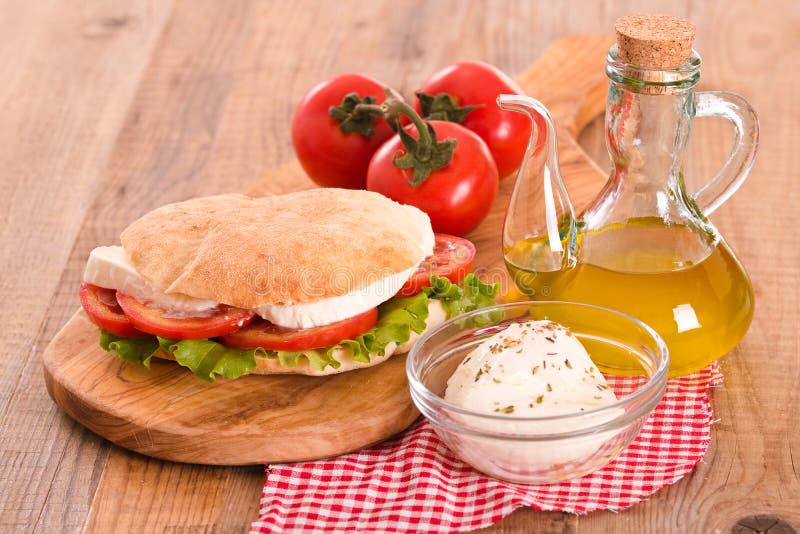 Puccia Bread with Mozzarella and Tomato. Stock Photo - Image of italy ...