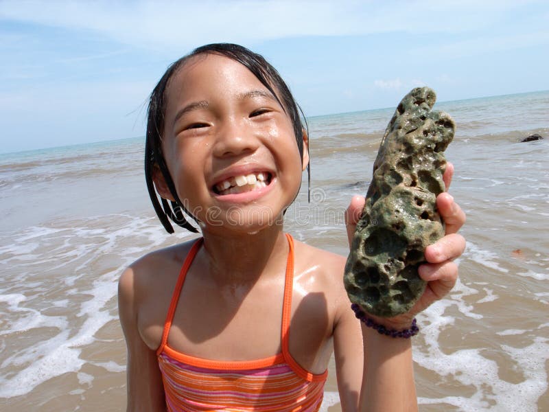 Puckish girl stock photo. Image of holiday, child, swimwear - 4973312