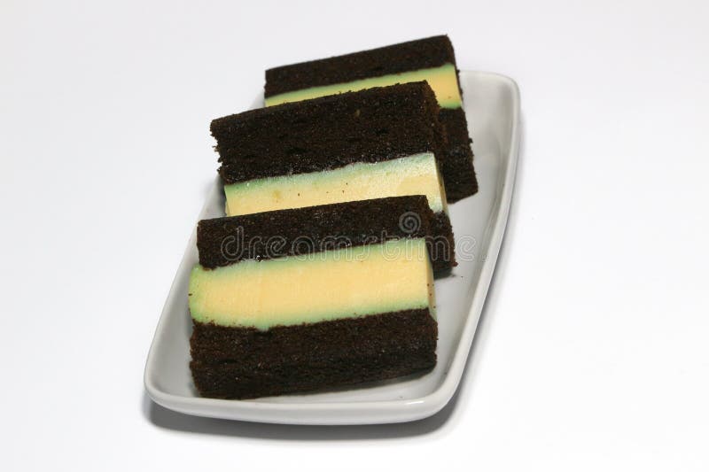 Pudding-covered Sponge Cake or Chocolate-covered Sponge Cake. Selective ...