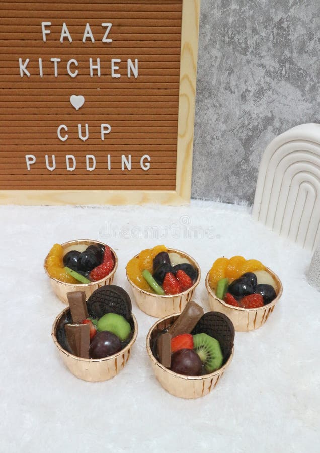 Pudding Decorated with Mint and Chocolate in a Cup. Stock Image - Image ...