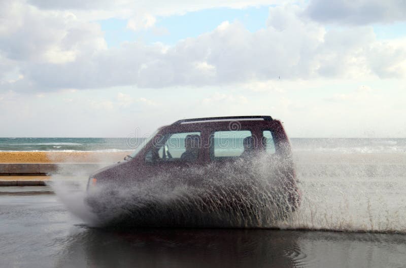 Puddle and car stock image. Image of sidewalk, road, splasch - 18495223