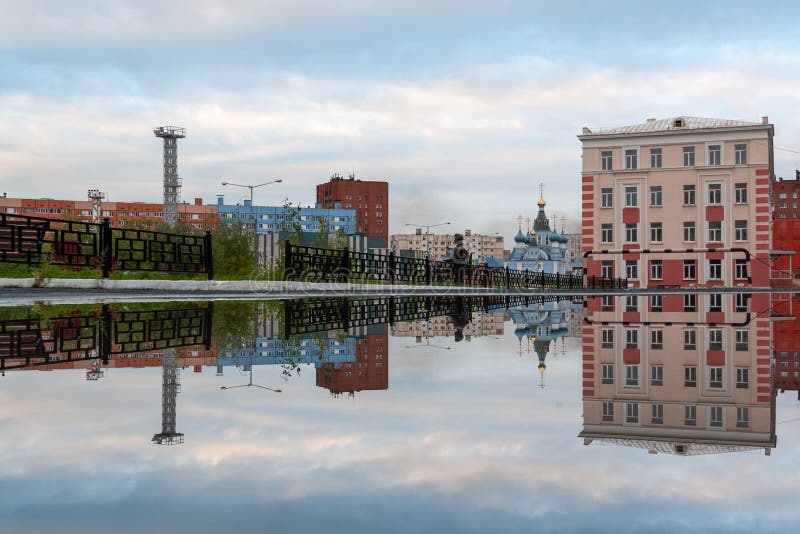 Puddle City Reflection, Norilsk Stock Image - Image of downtown ...
