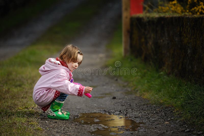 Puddle Fun stock image. Image of playing, countryside - 43905627