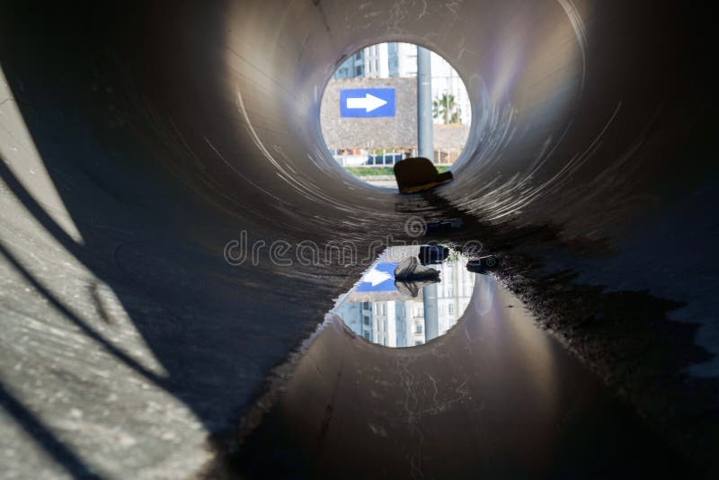 Puddle in the Inside of a Large Tube Stock Photo - Image of metal ...