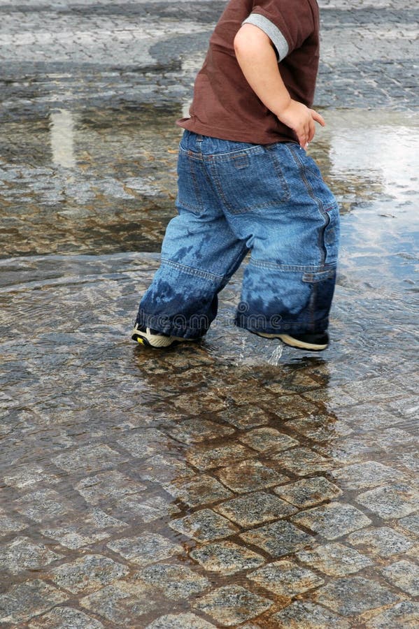 Puddle Jumper stock image. Image of rocks, water, hands - 1983005