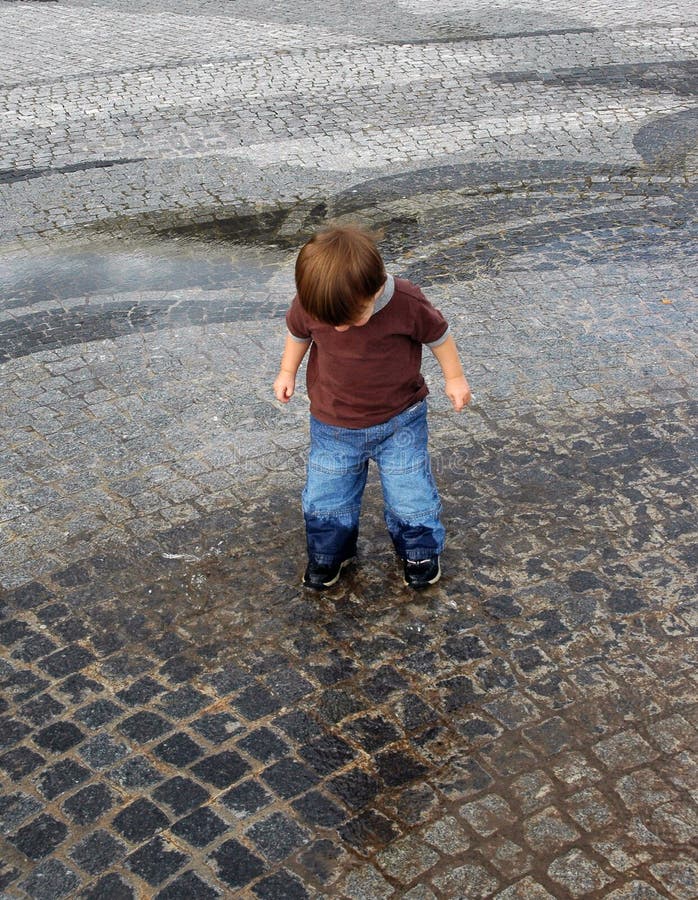 Puddle Jumping stock image. Image of cute, little, playing - 1982999
