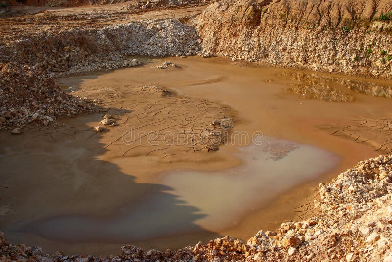 A Puddle of Mud at the Bottom of a Limestone Quarry Stock Image - Image ...