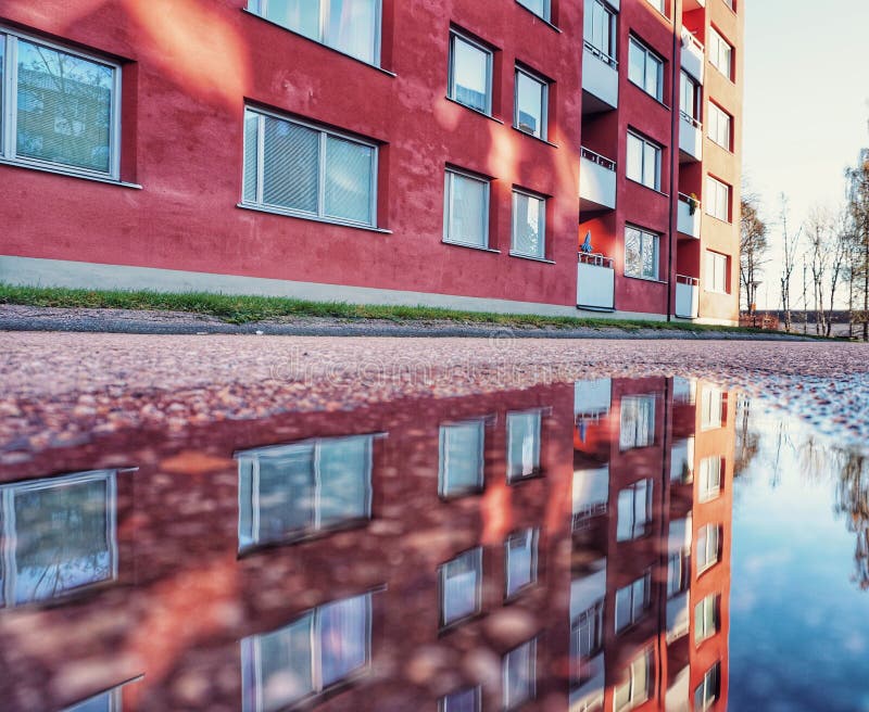 A Puddle Next To Building during Day Stock Image - Image of ...