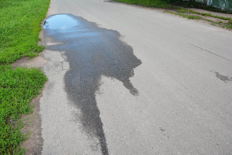 Puddle. Pot Hole or Pothole Image of a Broken Cracked Asphalt Pa Stock ...