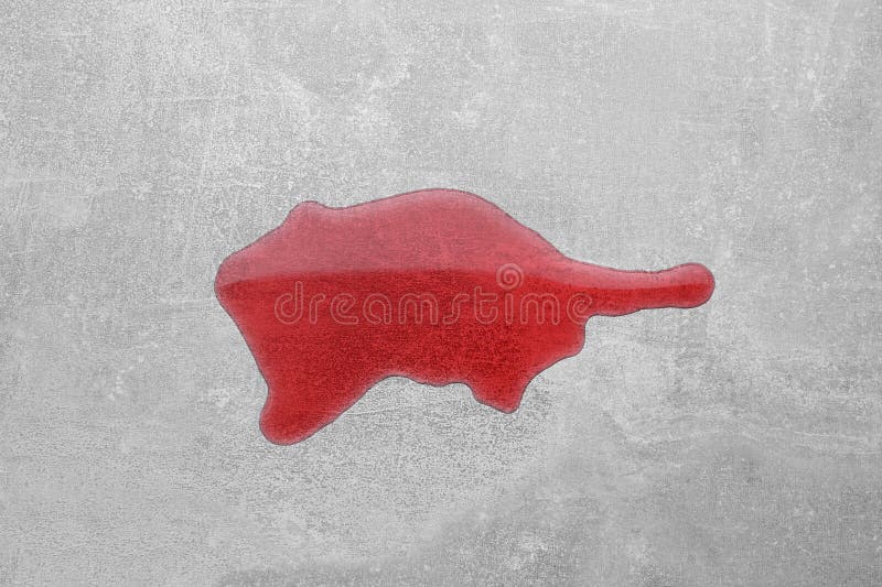 Puddle of Red Liquid on Light Grey Surface, Top View Stock Image ...