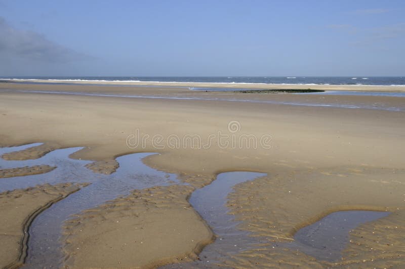 Puddle Reflection at Beach, Netherlands Stock Photo - Image of sands ...