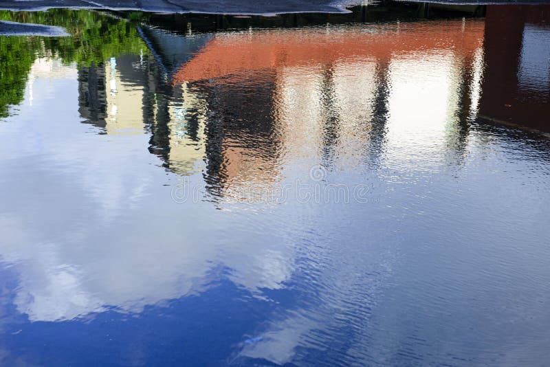 Puddle reflection of house stock photo. Image of sidewalk - 89230408