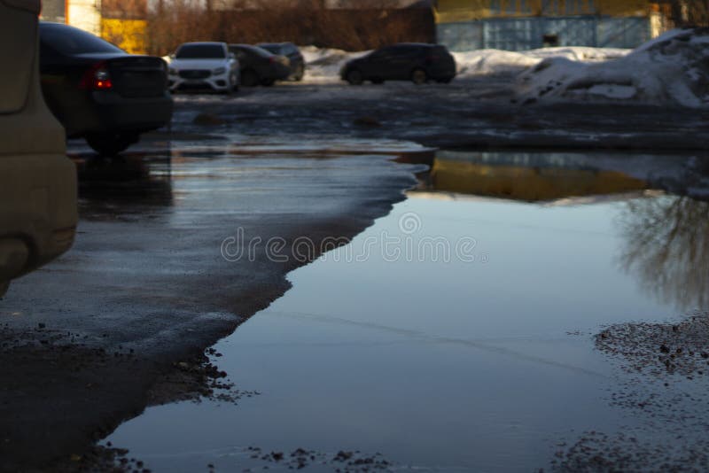 Puddle in Road. Wet Asphalt Stock Photo - Image of dirt, light: 254541724