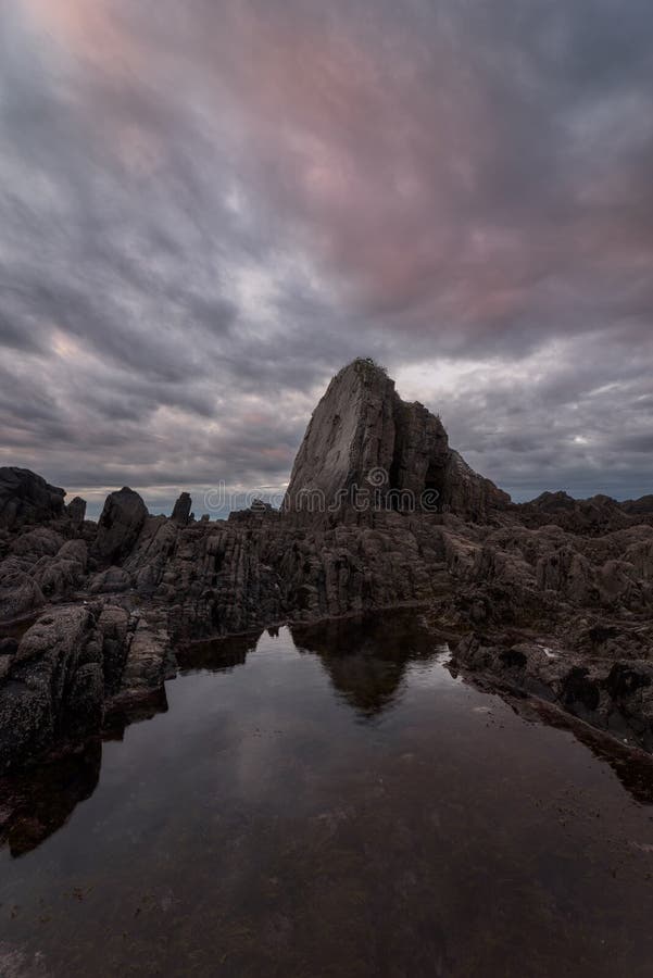 Puddle in the rocks stock image. Image of rocky, blue - 145317051