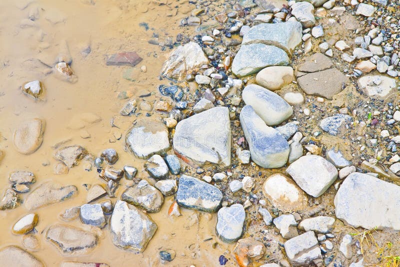 Puddle on Rocky Ground with Copy Space Stock Image - Image of rock ...