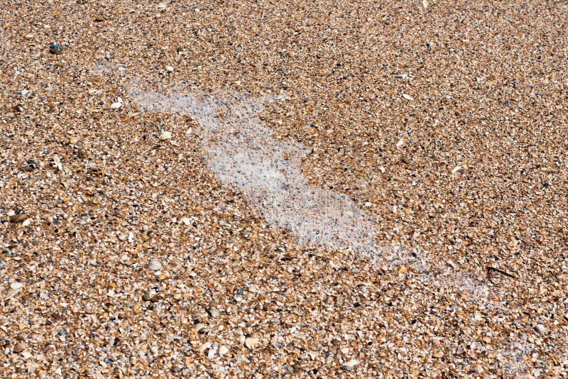 Puddle on a beach stock image. Image of scenics, beach - 84472951