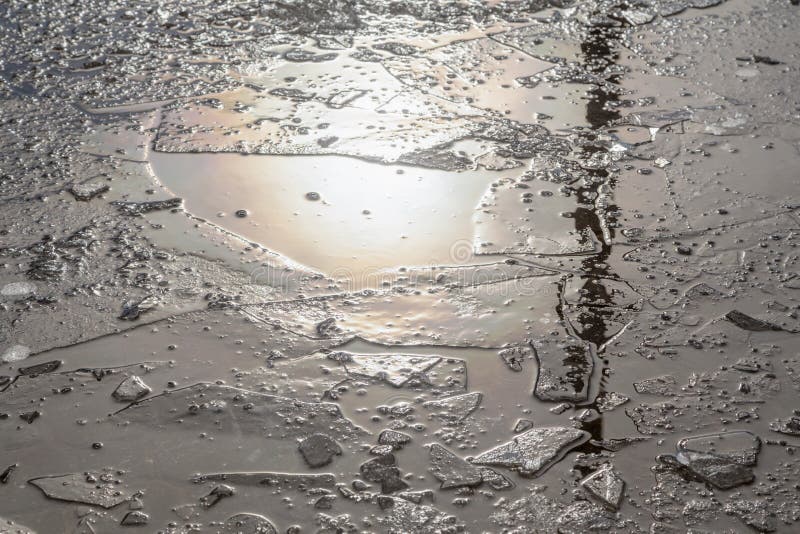 Puddles and chopped ice stock photo. Image of iced, close - 68377374