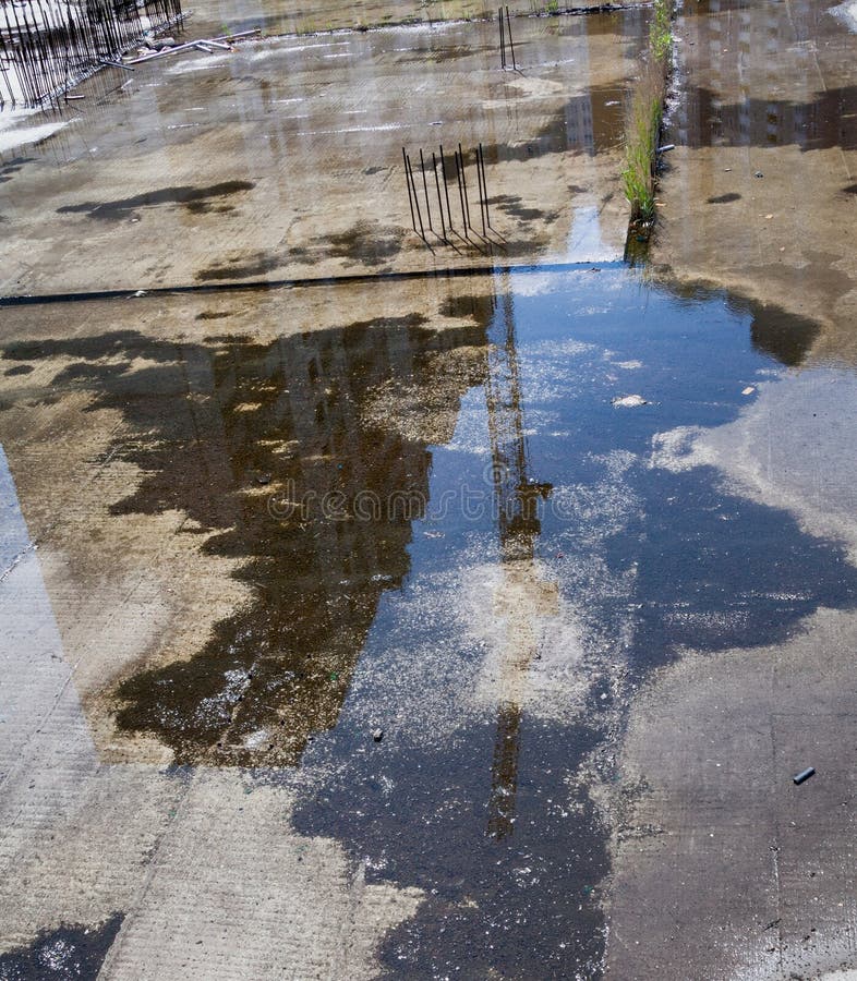Puddles on the Concrete Surface Stock Photo - Image of abstract ...