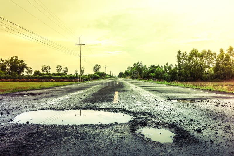 Puddles on the Road when it Rains Stock Image - Image of light ...