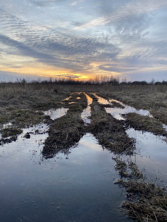 Puddles of Water Reflecting Sunset Stock Photo - Image of puddles ...