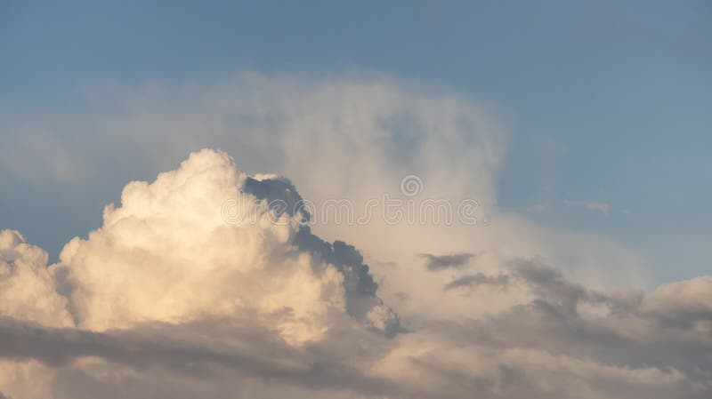 Puff Clouds in the Sky during Sunset. Zoom in Stock Photo - Image of ...