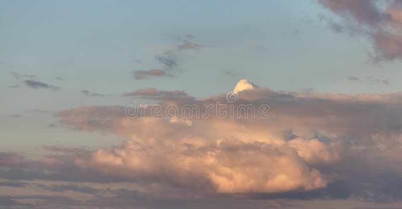 Puff Clouds in the Sky during Sunset. Zoom in Stock Image - Image of ...