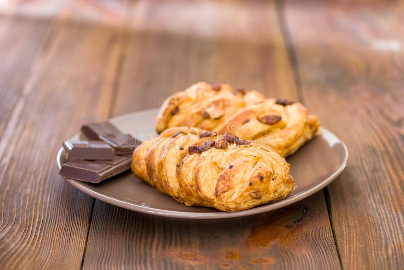 Puff Pastry Biscuit with Peaches and a Cube of Chocolate Stock Photo ...