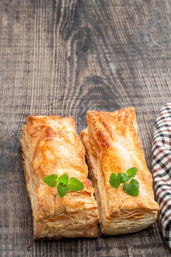 Puff Pastry Cake Slices on Wooden Board Stock Image - Image of ...