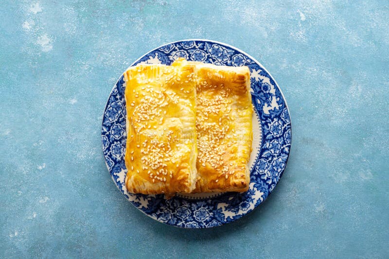 Puff Pastry Dough. Folded Baked Puff Pastry Pie in a Plate, Blue ...