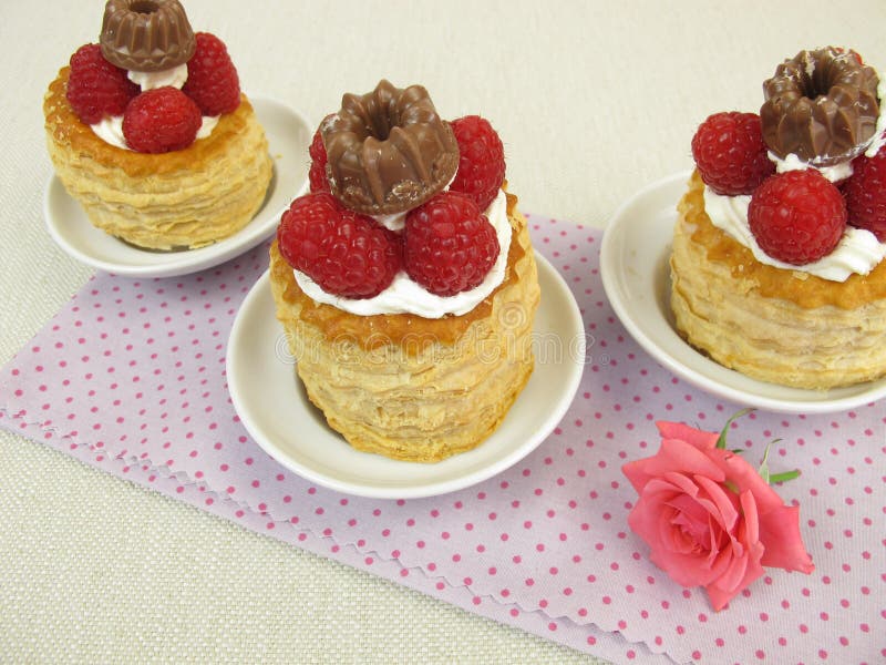 Puff Pastry Filled with Raspberry, Whipped Cream and Chocolate Stock ...