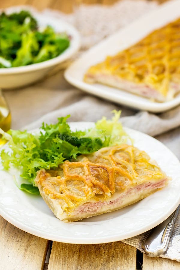Puff Pastry Pasty with Bechamel Sauce, Ham and Cheese Stock Image ...