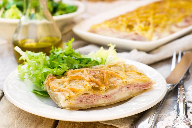Puff Pastry Pasty with Bechamel Sauce, Ham and Cheese Stock Image ...