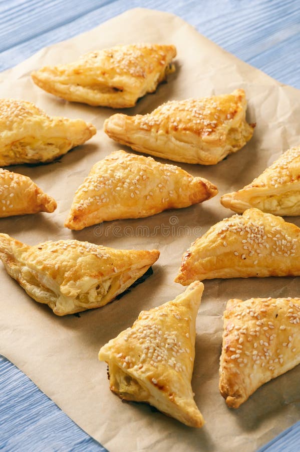 Puff Pastry Triangles Filled with Feta Cheese and Leek. Stock Photo ...