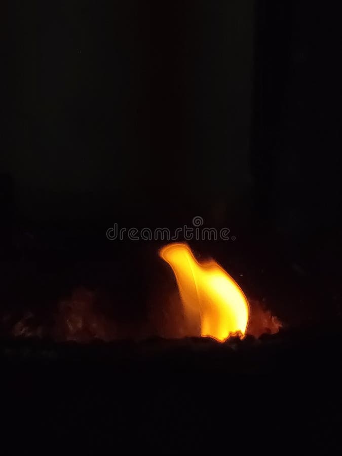 A Puff of Small Fire Rising from a Firebox Stock Photo - Image of ...