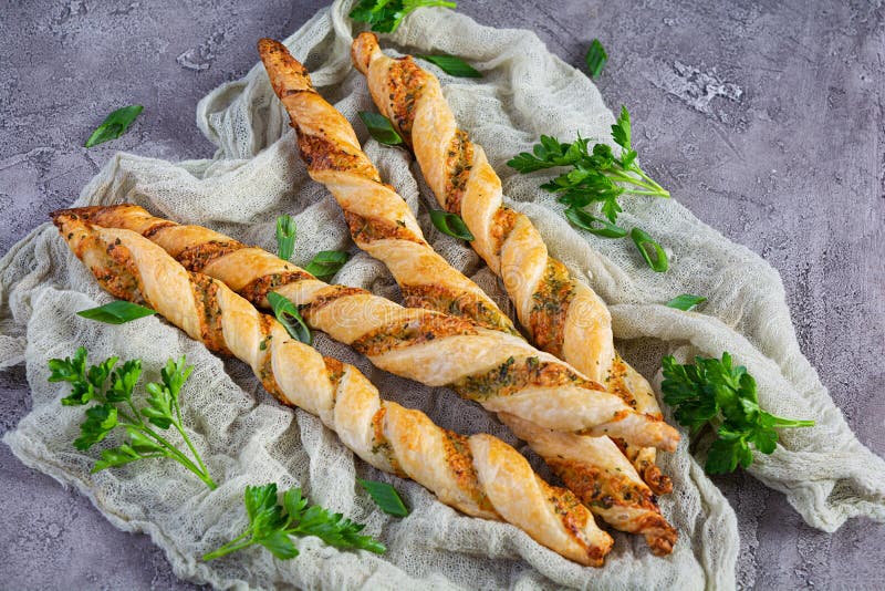 Puff Sticks with Cheese and Herbs. Homemade Breadsticks with Sauce ...