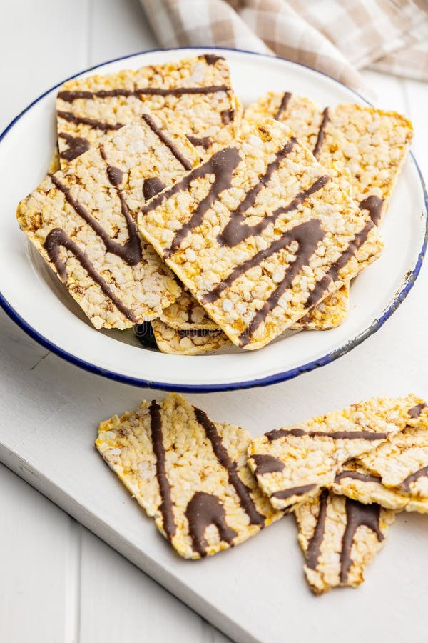 Puffed Corn Crackers Chocolate Covered on White Table Stock Image ...