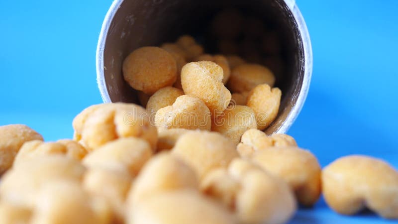 Puffed Corn Rings Chips in Black Bowl on White Background Stock Video ...