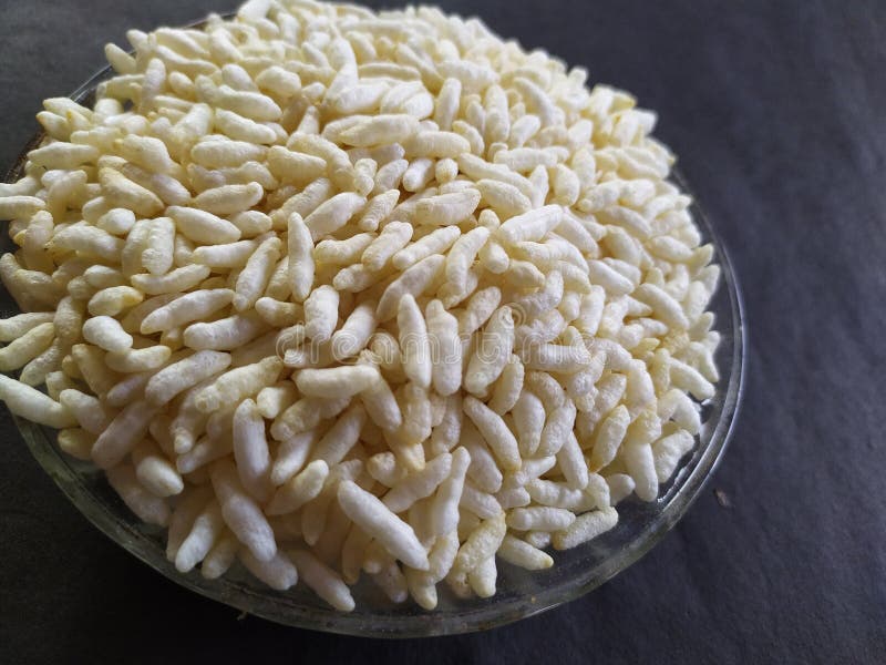 Puffed rice in a bowl stock photo. Image of ingredient - 172576718