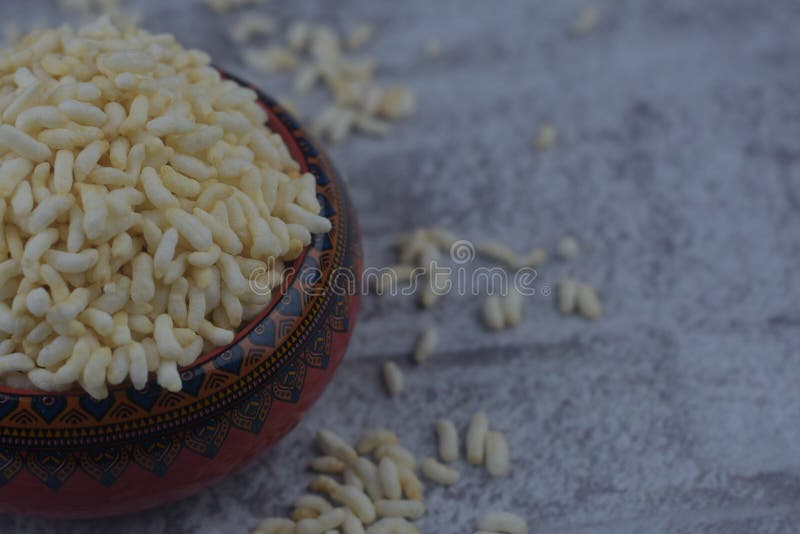 Puffed Rice in Half Bowl View Stock Photo - Image of churmur, focus ...